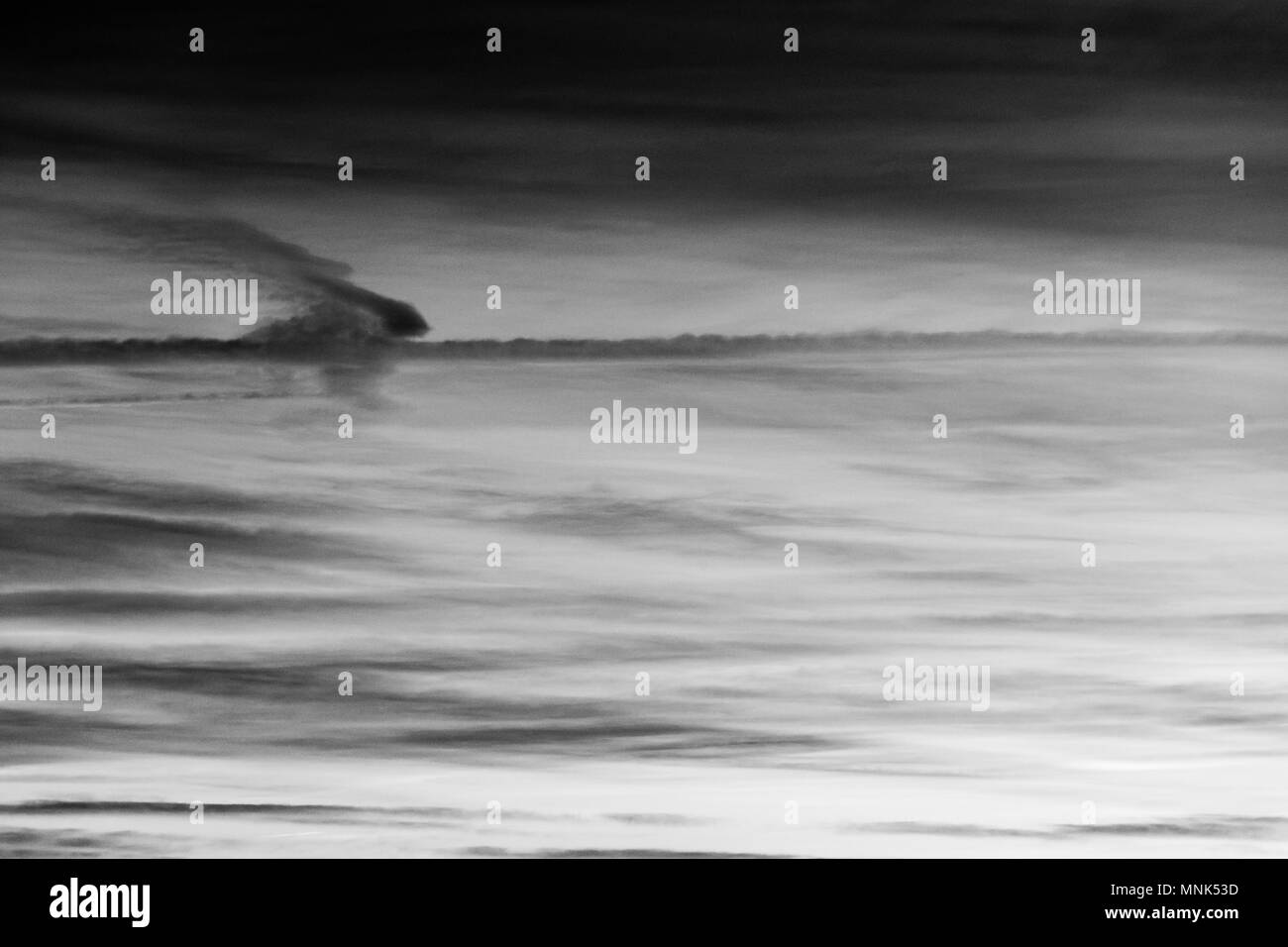 Clouds and jet vapor trails creating beautiful texture in the sk Stock ...