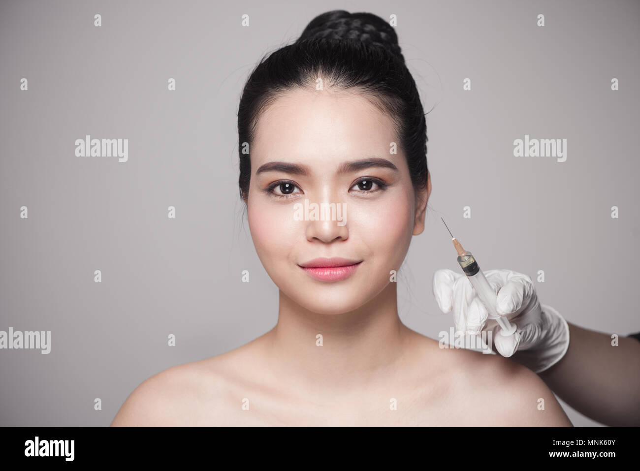 Beautiful woman gets makeup hi-res stock photography and images - Alamy