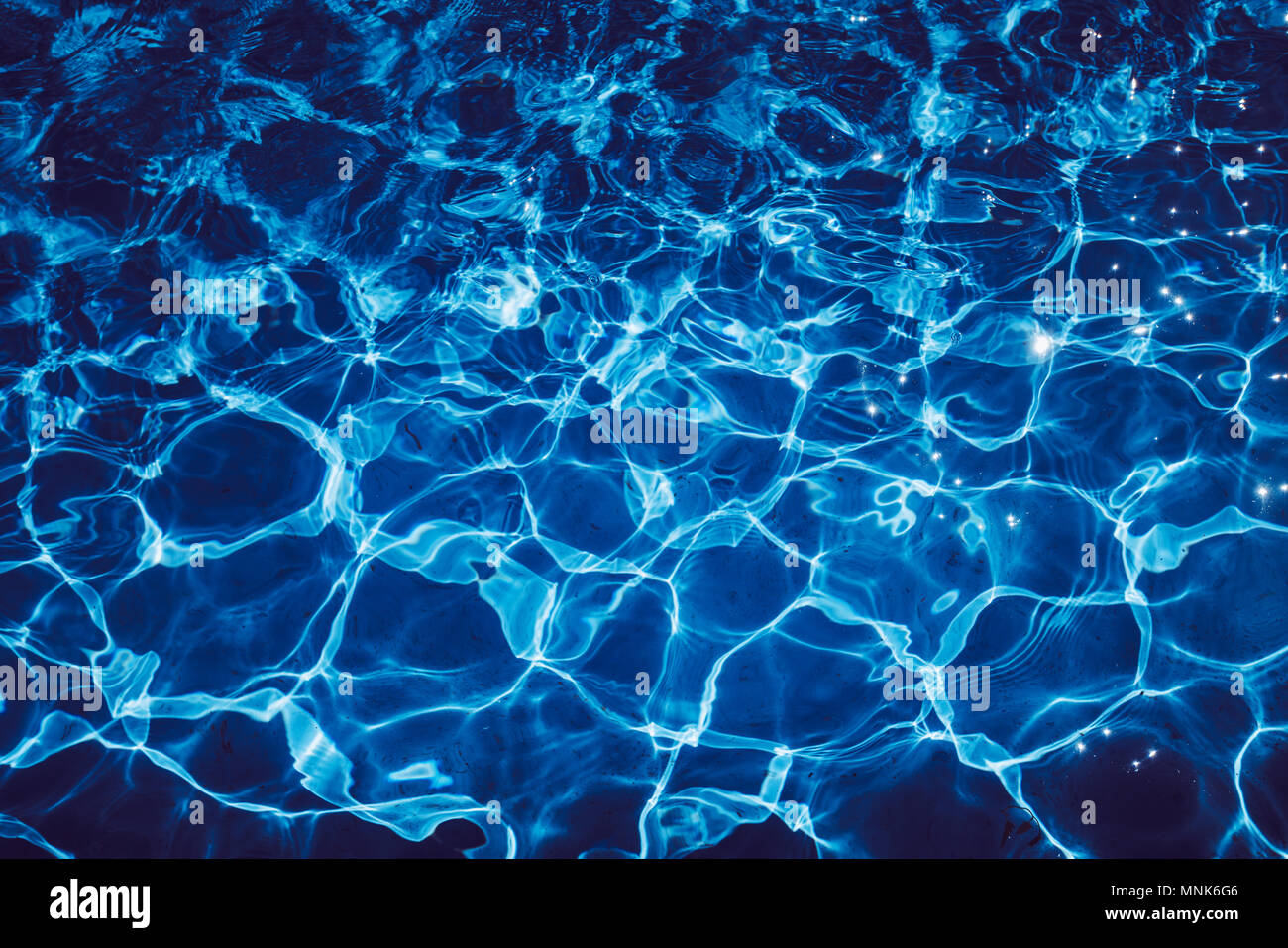 Blue ripped water in swimming pool Stock Photo - Alamy