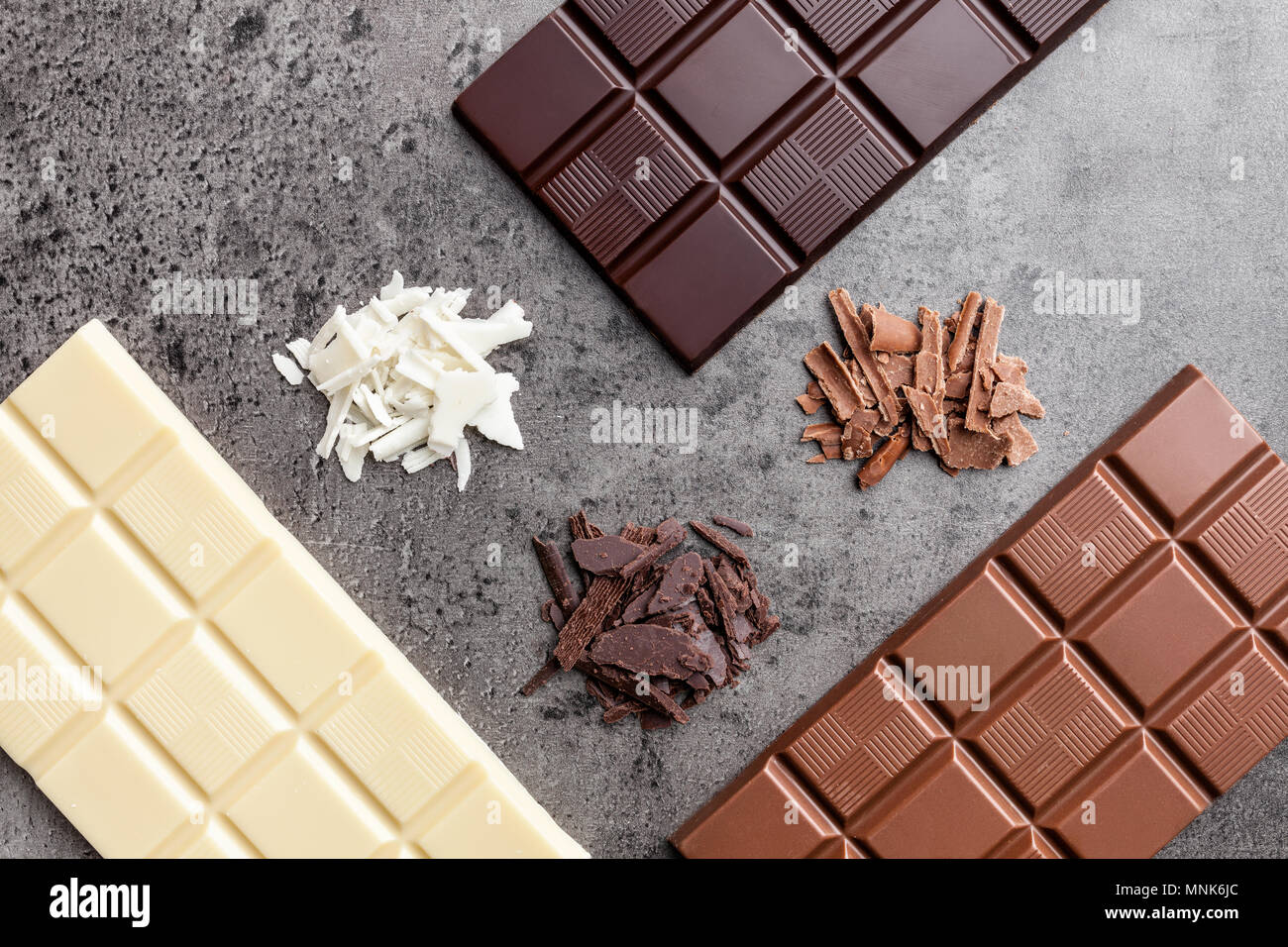 Delicious and sweet variety of chocole on rustic background Stock Photo ...