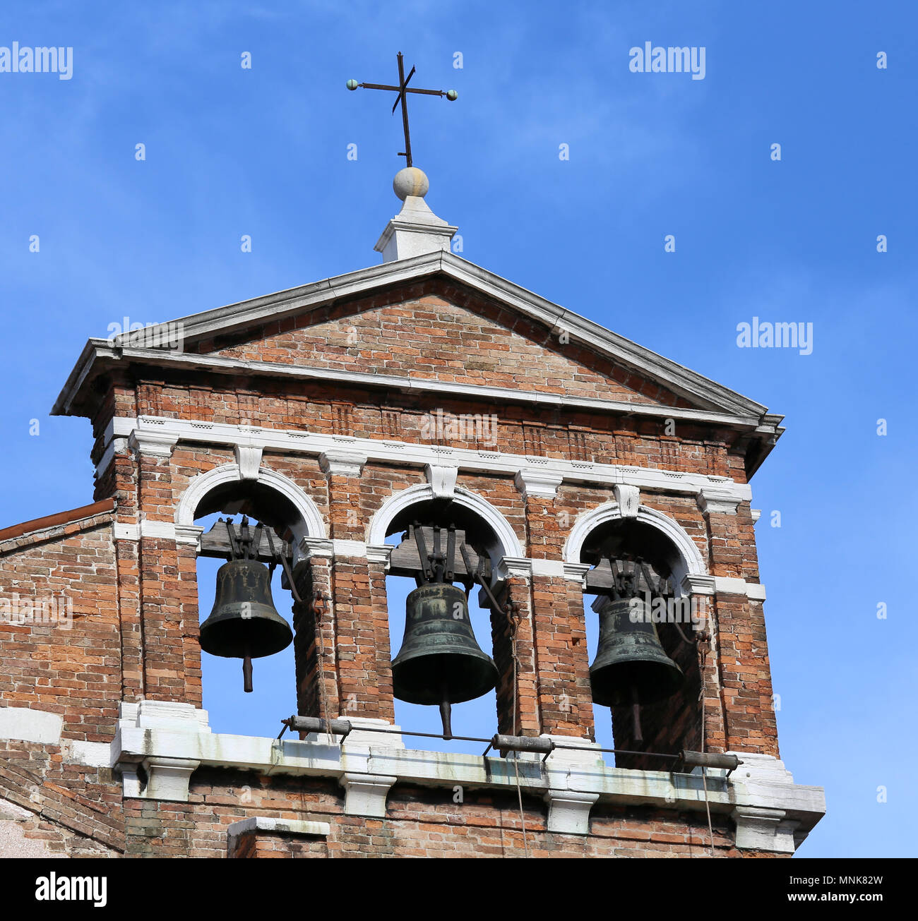 red brick bell tower with three metal bells in Venice Stock Photo - Alamy