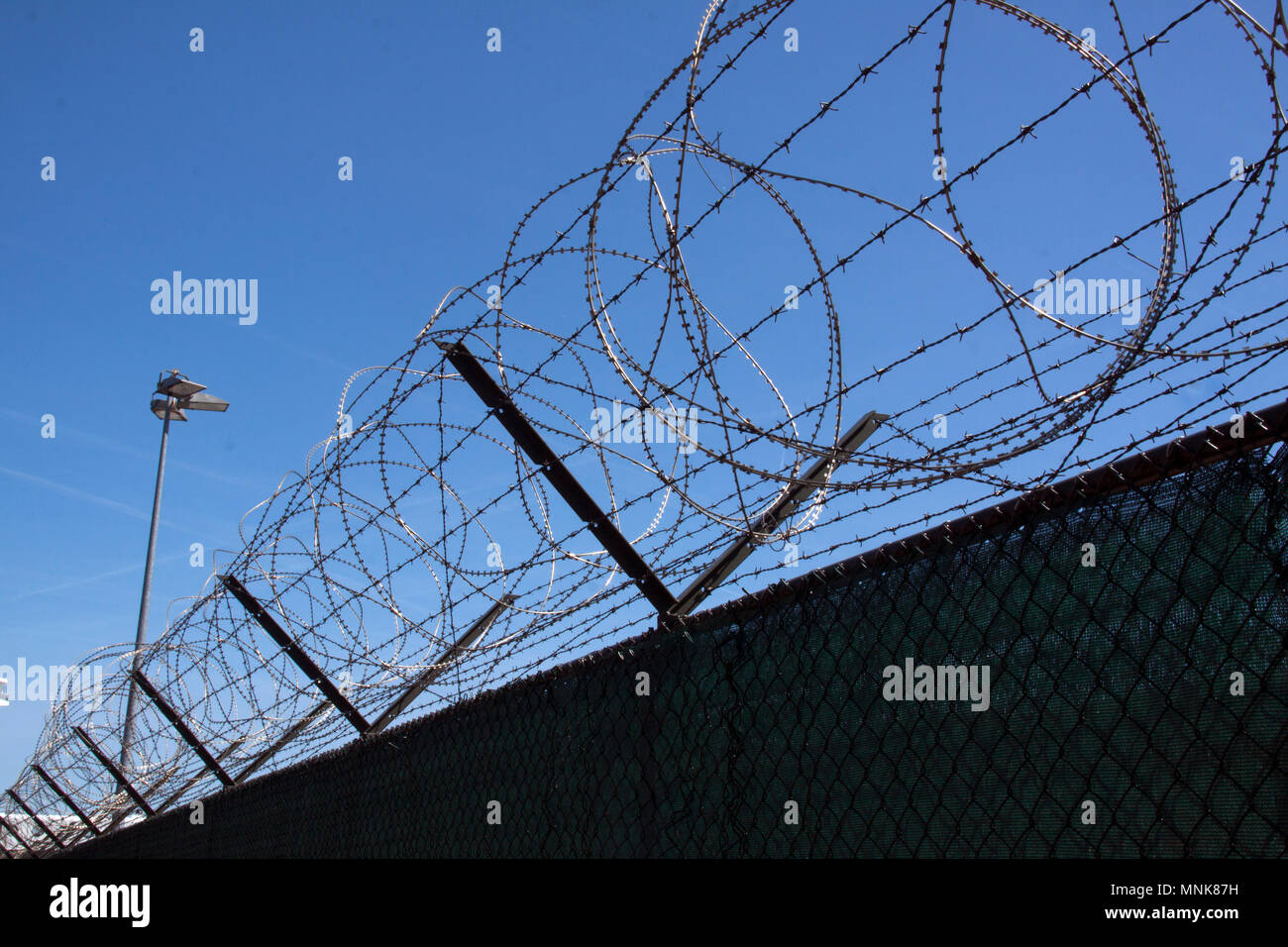 Prison fence hi-res stock photography and images - Alamy