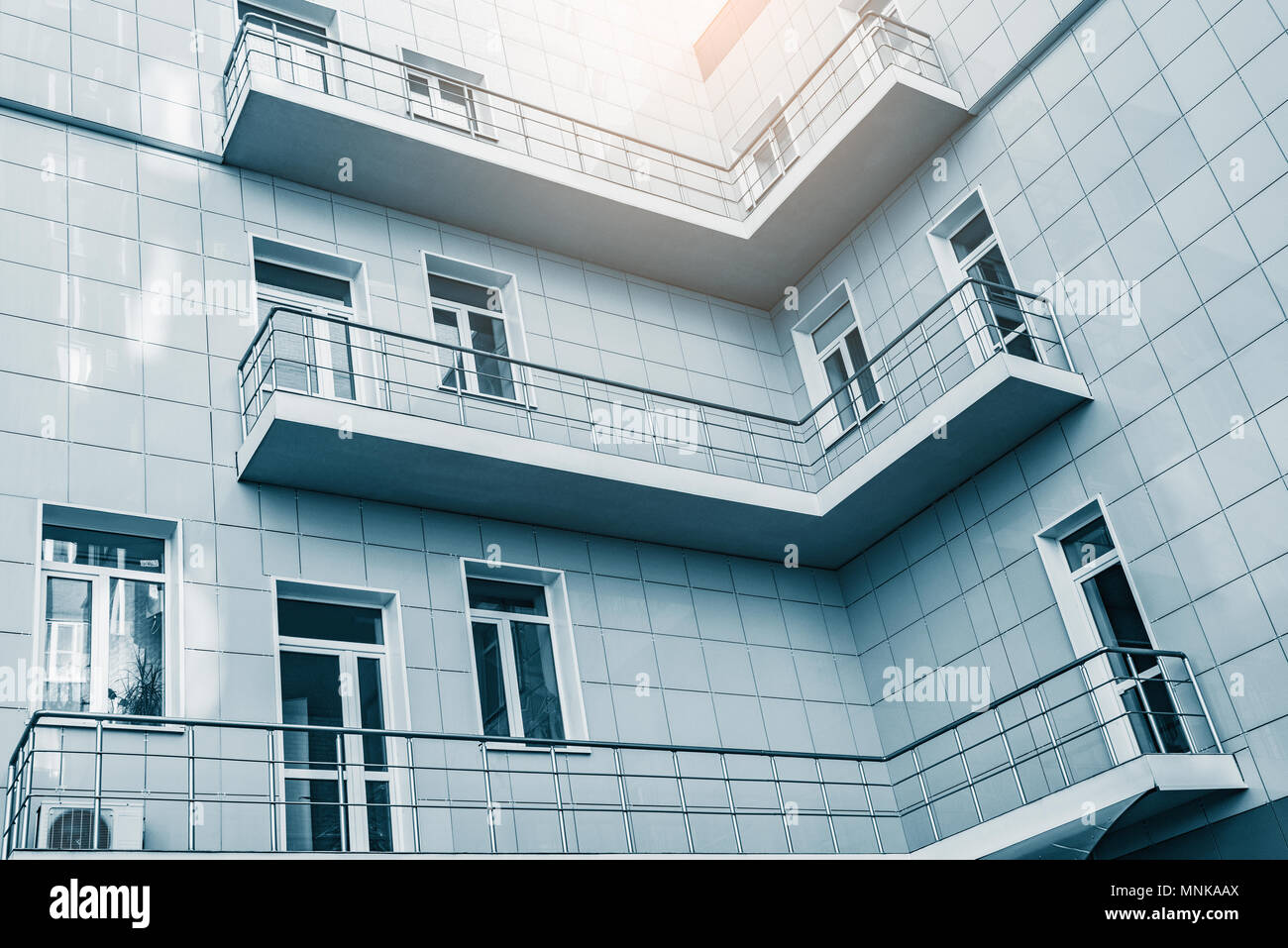 Balconies in the corner of the modern business office building Stock ...