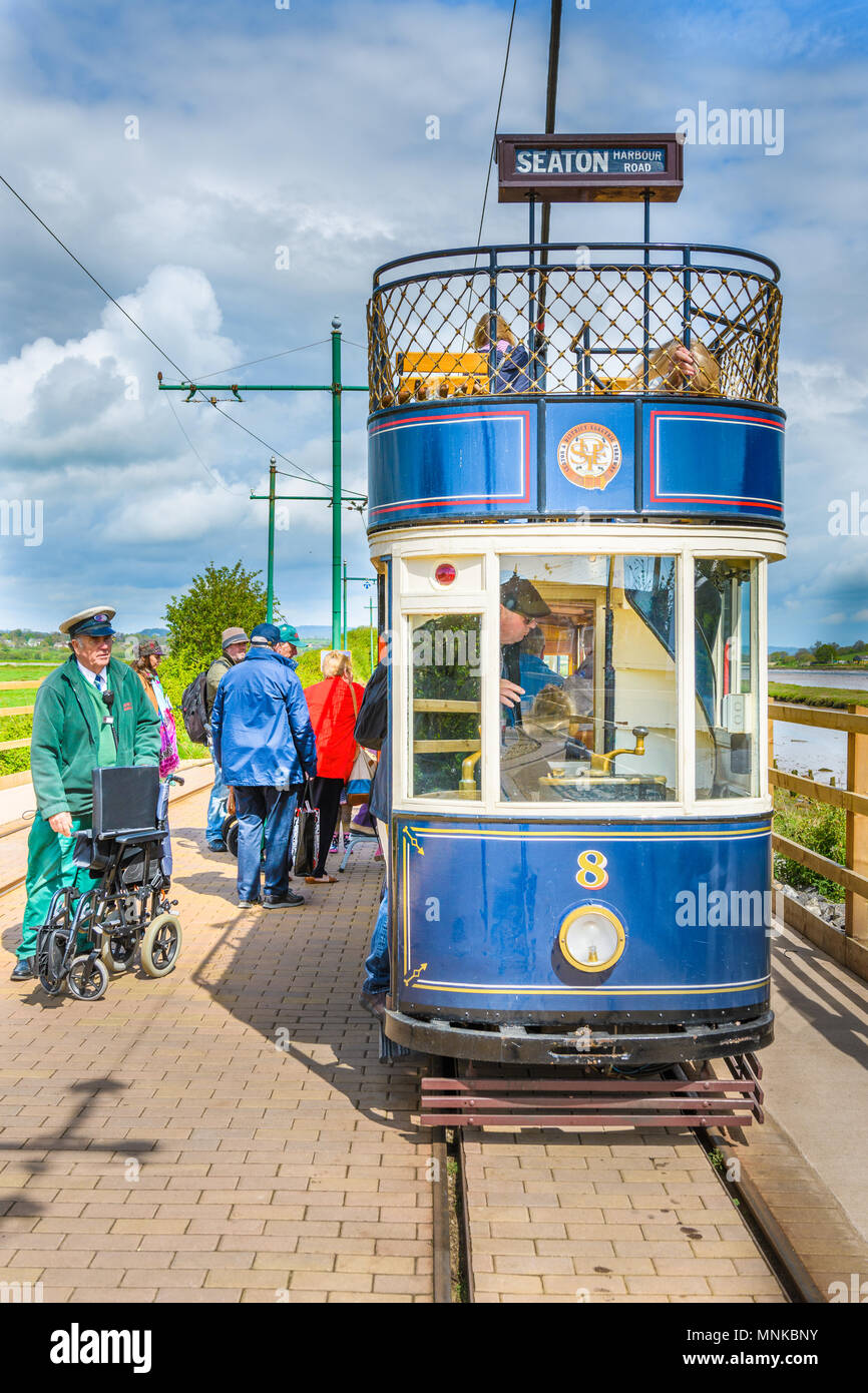 Passengers board the tram at the Riverside terminus of the Seaton and ...