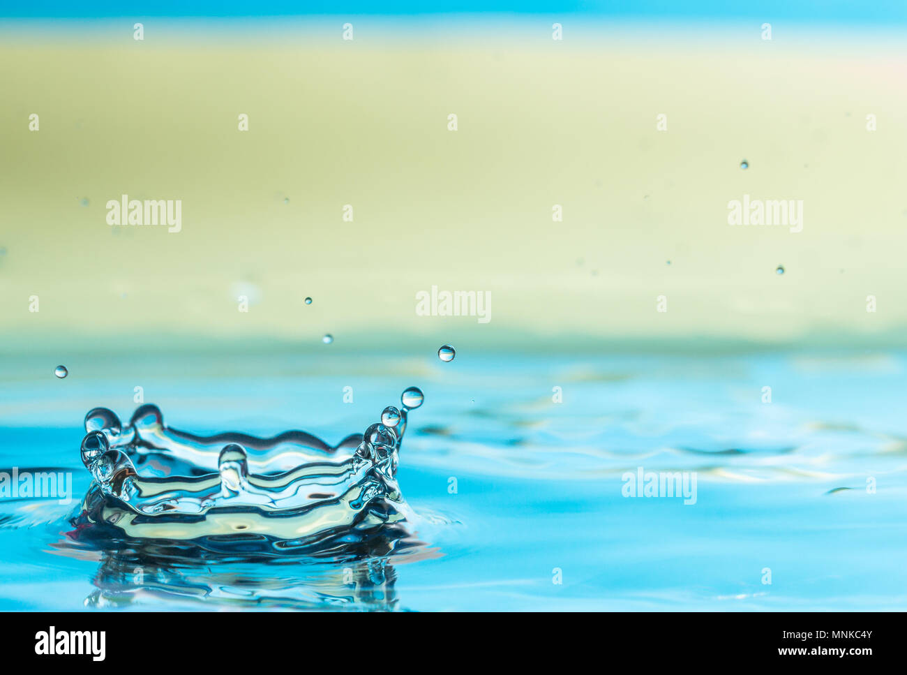 water drop splashing on the surface Stock Photo - Alamy