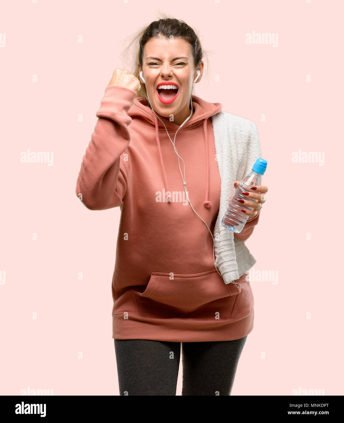 Young sport woman wearing workout sweatshirt irritated and angry ...