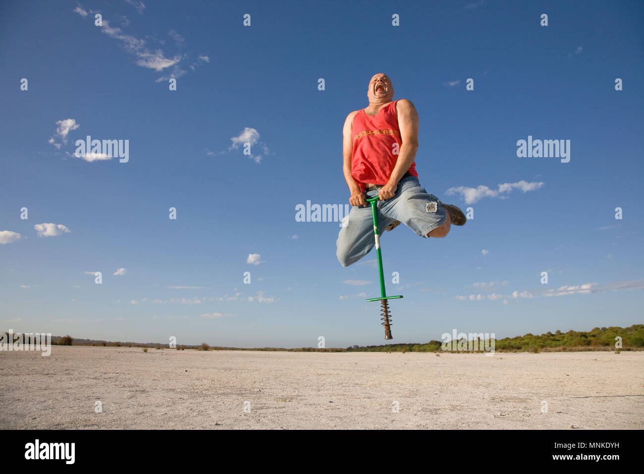Pogo stick man hi-res stock photography and images - Alamy