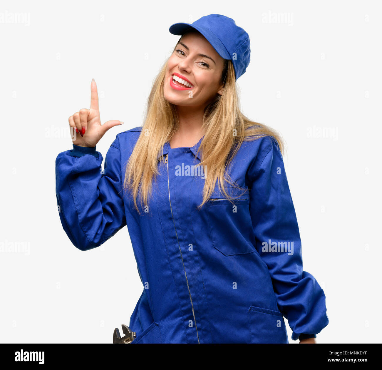 Woman plumber fixing kitchen hi-res stock photography and images - Alamy