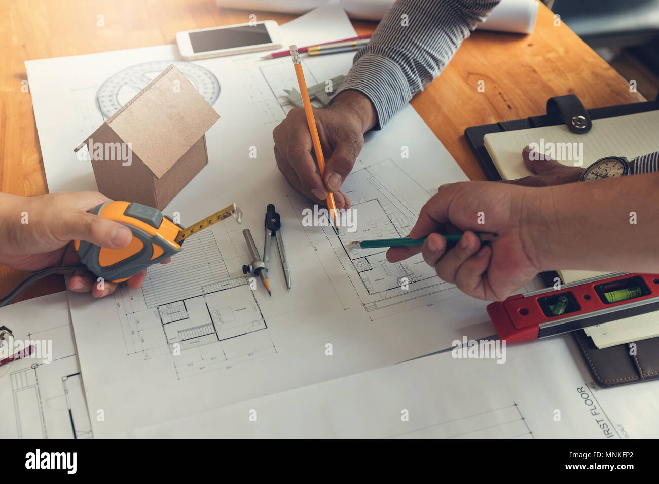 Engineer and Architect concept, Engineer Architects office team working ...