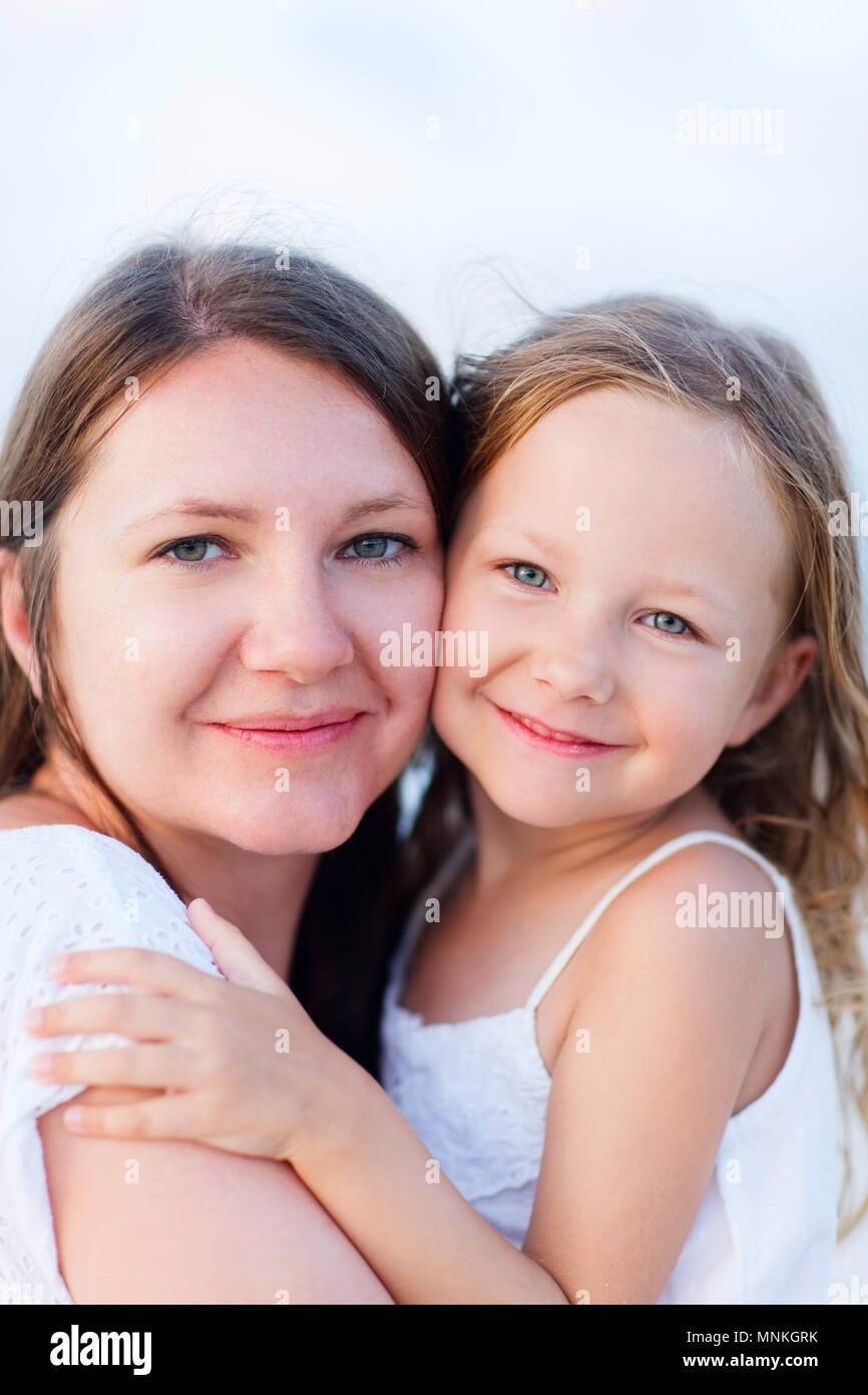 Beautiful mother and her adorable little daughter Stock Photo - Alamy