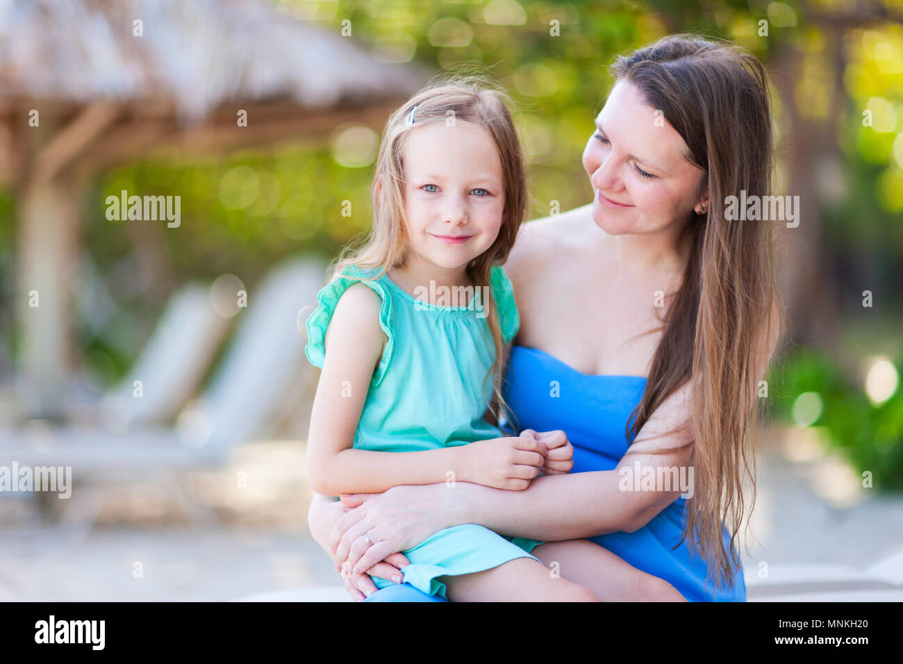 Happy mother and her adorable little daughter outdoors Stock Photo - Alamy
