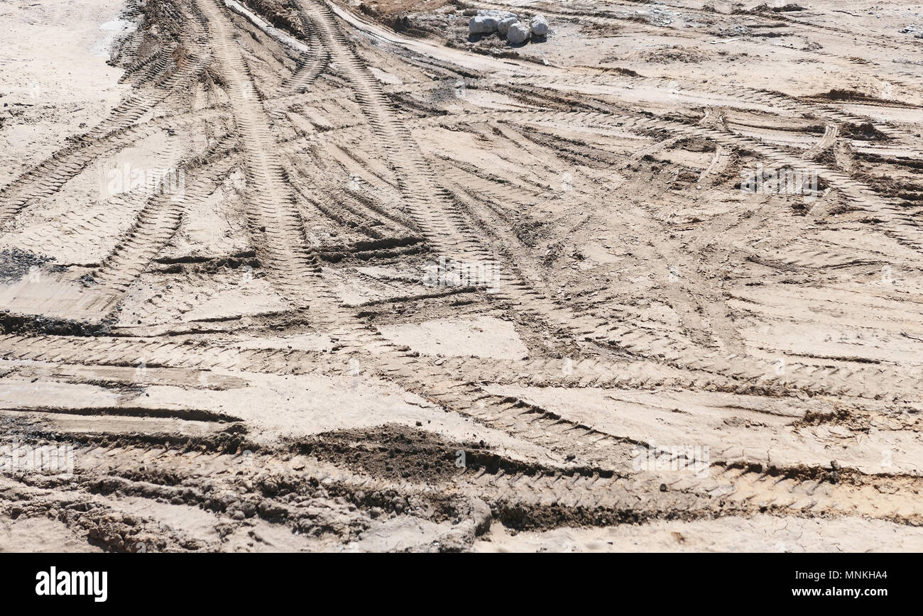 Wheel track mark on sand in construction site Stock Photo - Alamy