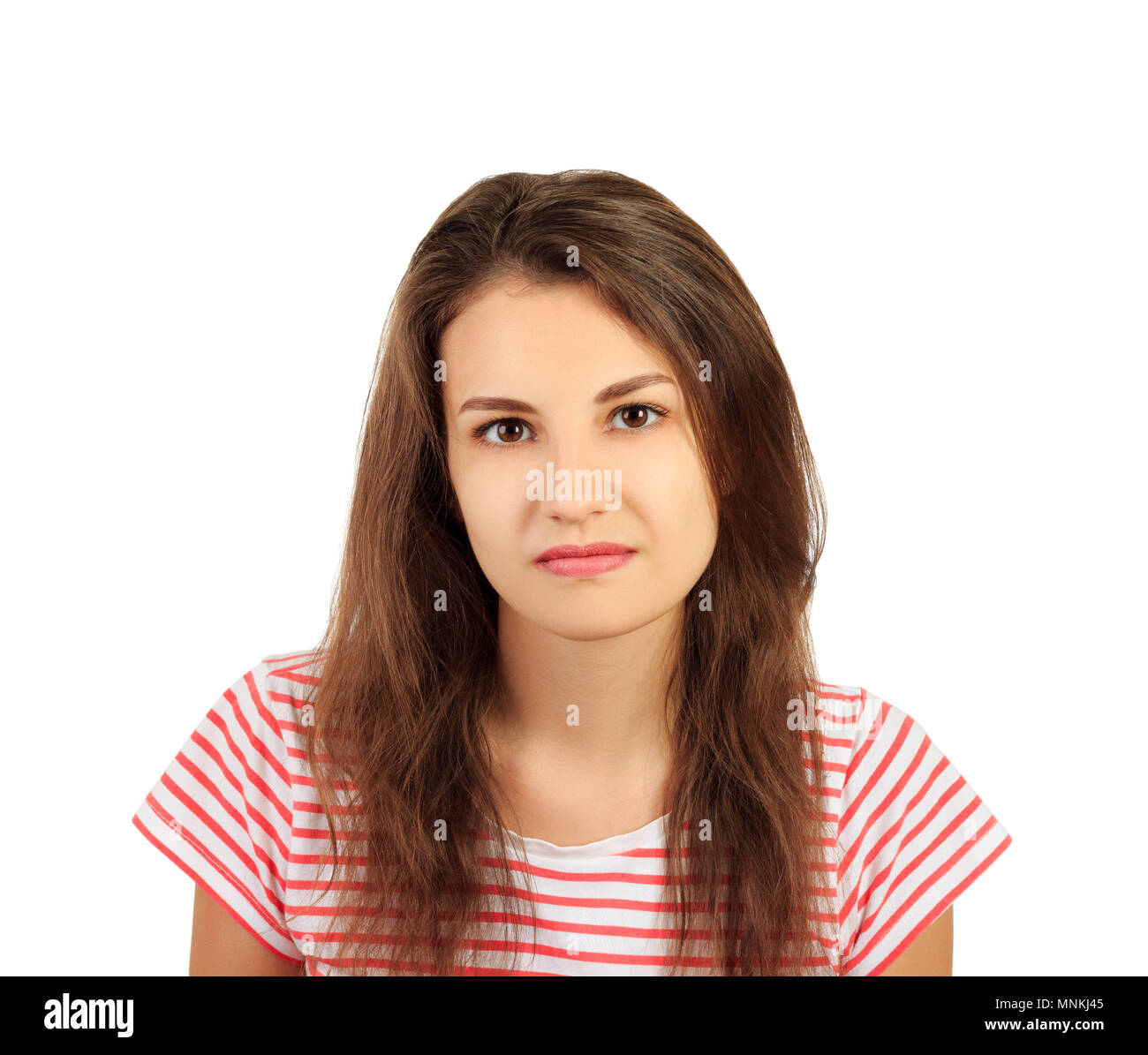 Young serious angry woman in shirt portrait. emotional girl isolated on ...