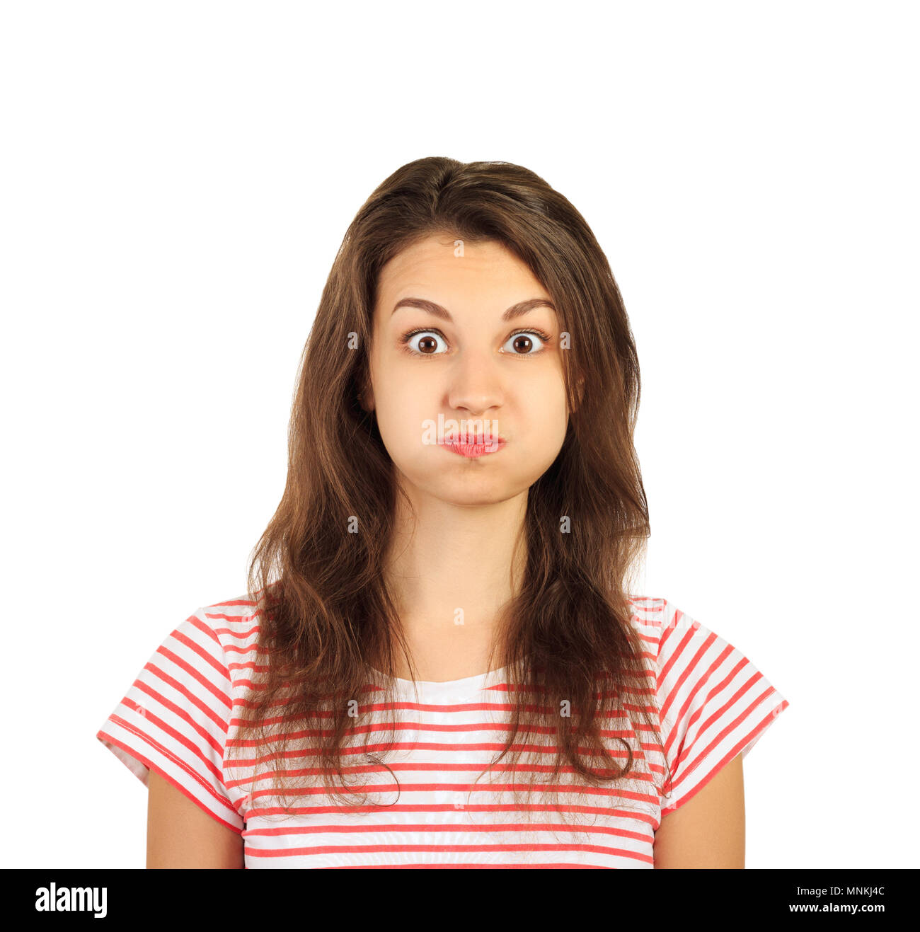 Funny and crazy pretty girl puffing out her cheeks. emotional girl ...