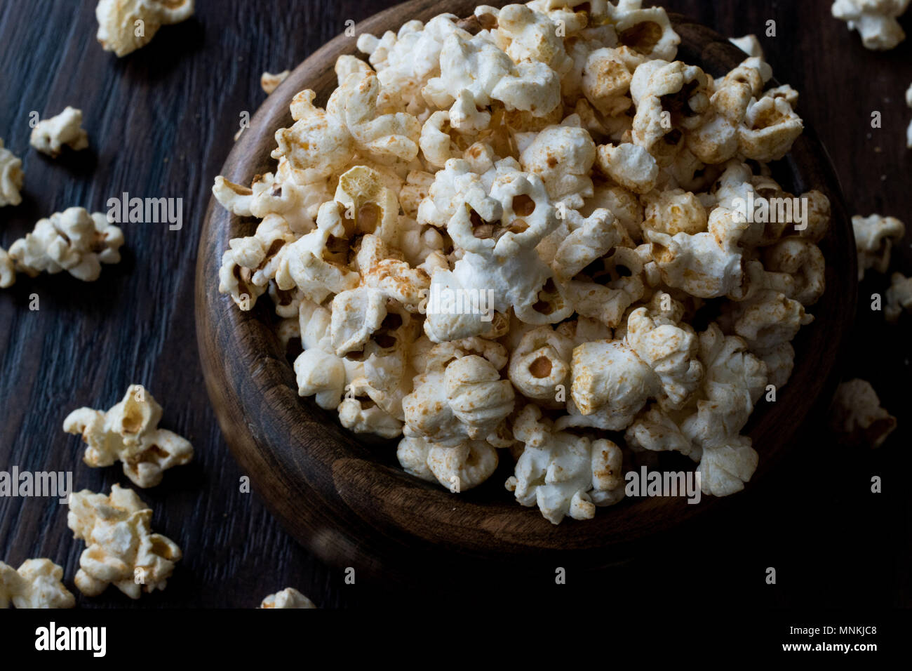 Sweet Honey Popcorn in a wooden bowl. Appetizer Concept Stock Photo - Alamy