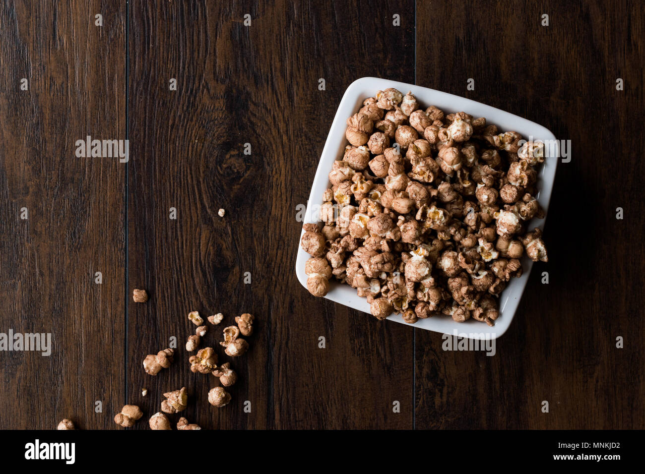 Chocolate Popcorn on dark Wooden Surface. Appetizer Food Stock Photo ...
