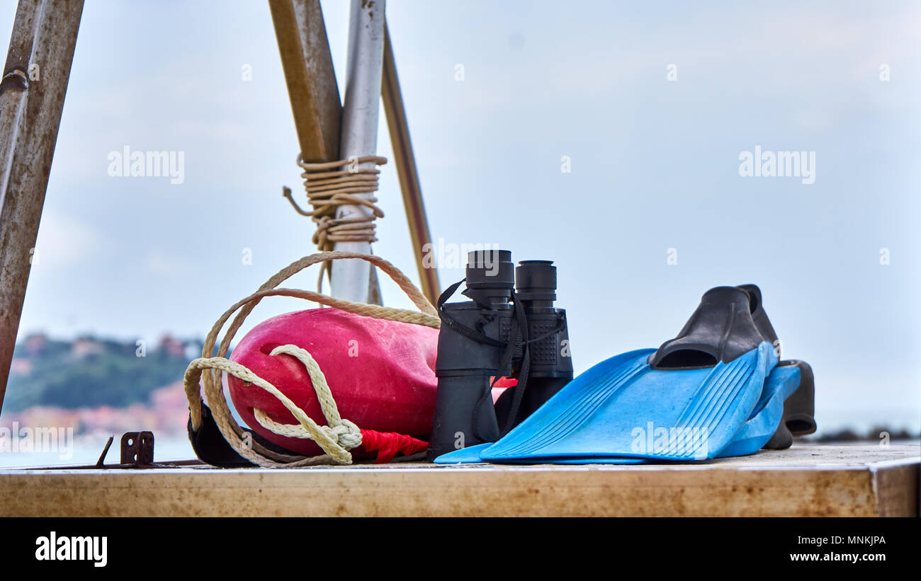 Italian Lifeguard Gear Including Red Buoy Binoculars and Blue Swimming ...
