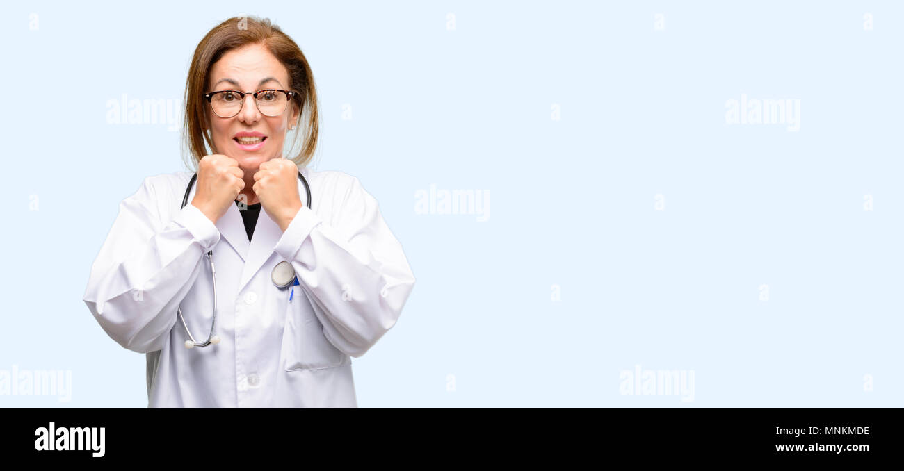 Doctor woman, medical professional terrified and nervous expressing ...