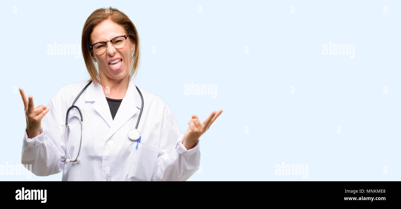 Doctor woman, medical professional looking at camera showing tong and ...