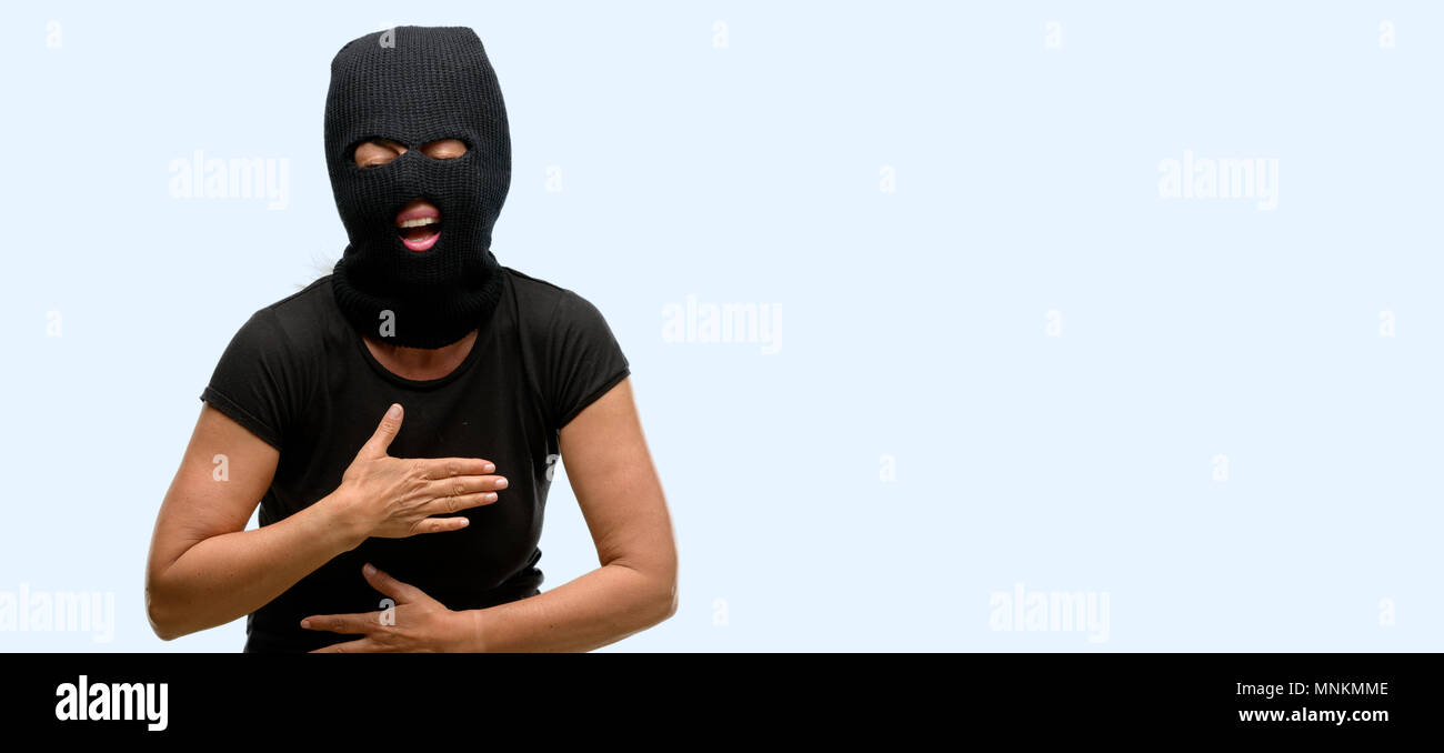 Burglar terrorist woman wearing balaclava ski mask confident and happy ...