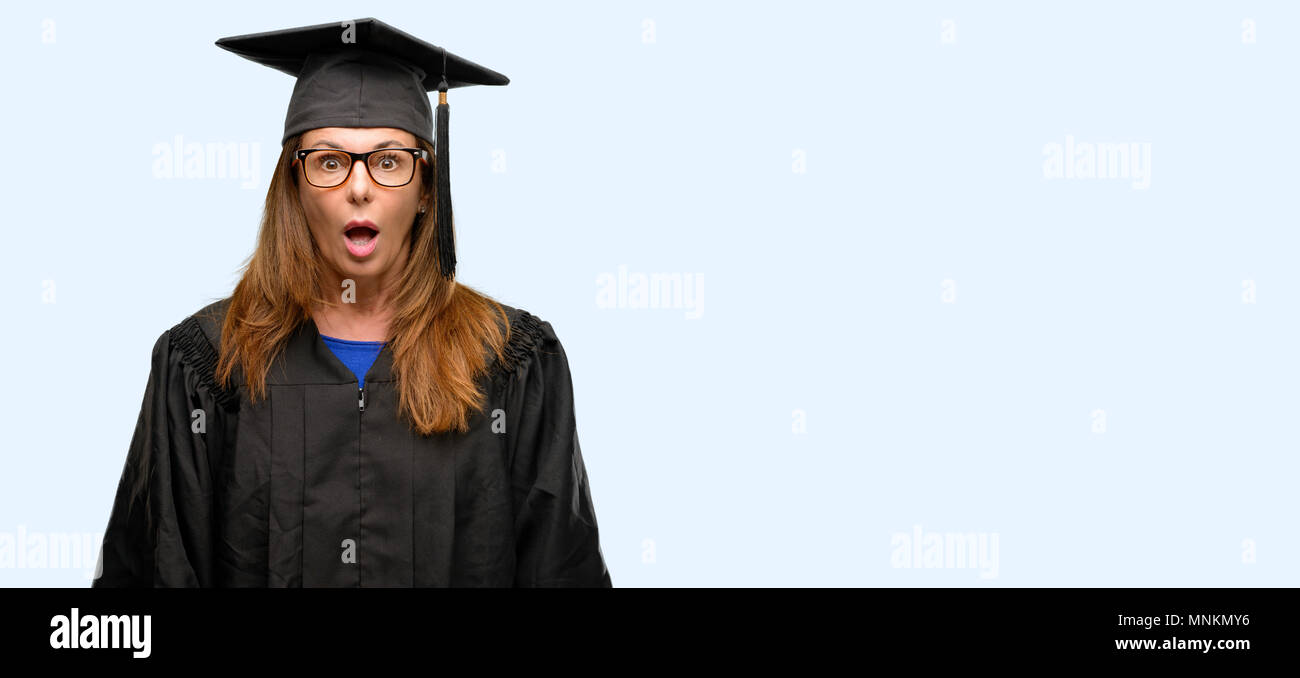Senior graduate student woman scared in shock, expressing panic and ...