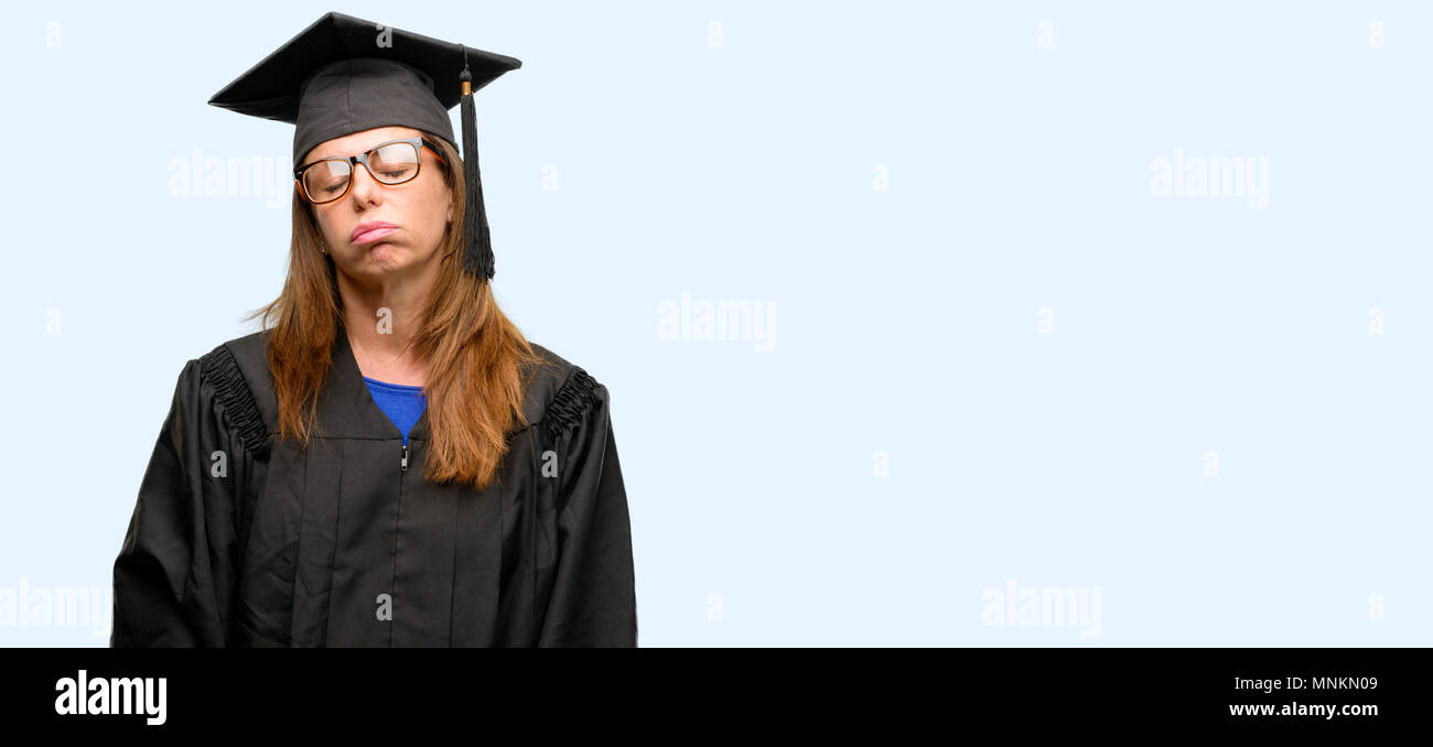 Senior graduate student woman with sleepy expression, being overworked ...