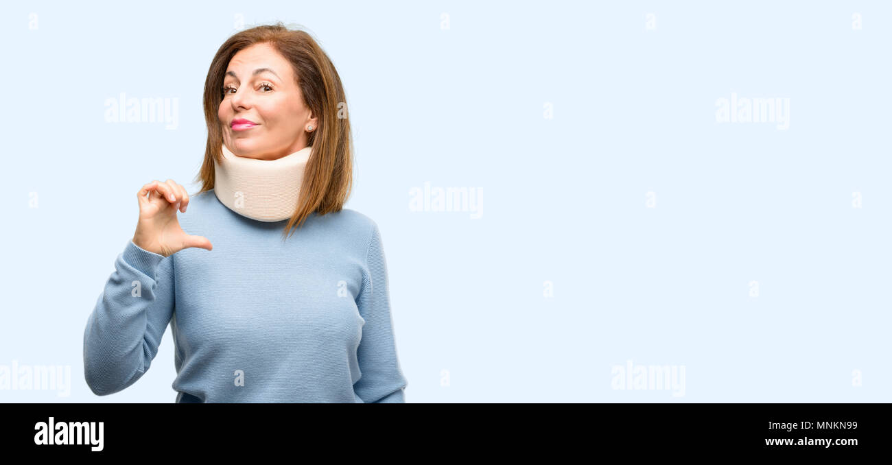 Injured woman wearing neck brace collar proud, excited and arrogant ...