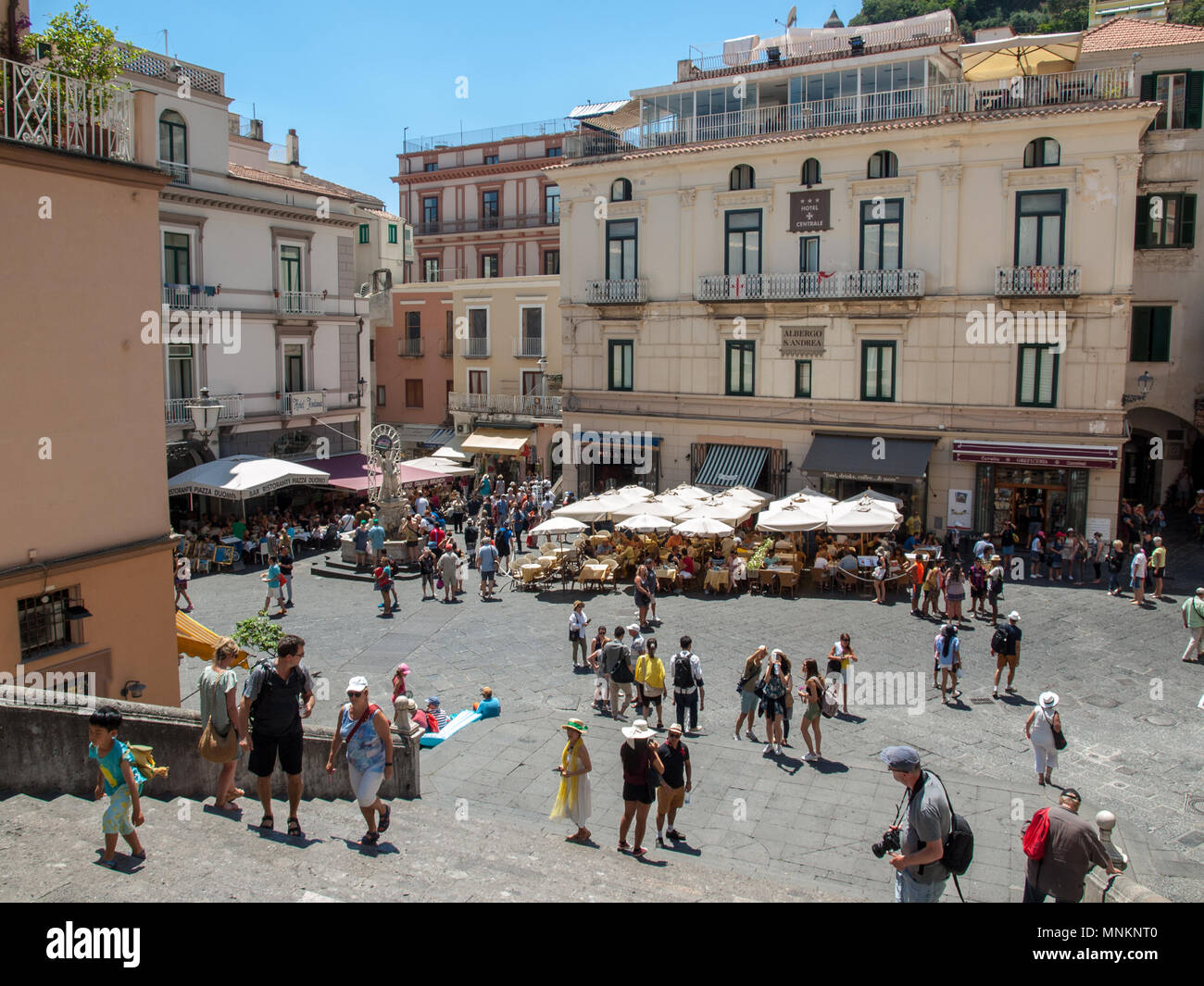 Amalfi, Italy - June 13, 2017: Tourists visit famous Piazza del Duomo ...