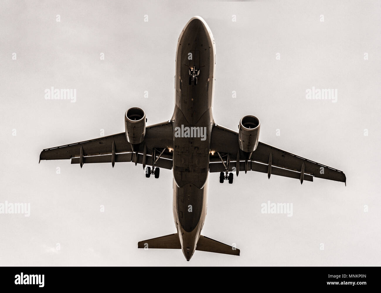 Airplane, Aircraft bottom, flying, take-off, landing Stock Photo - Alamy
