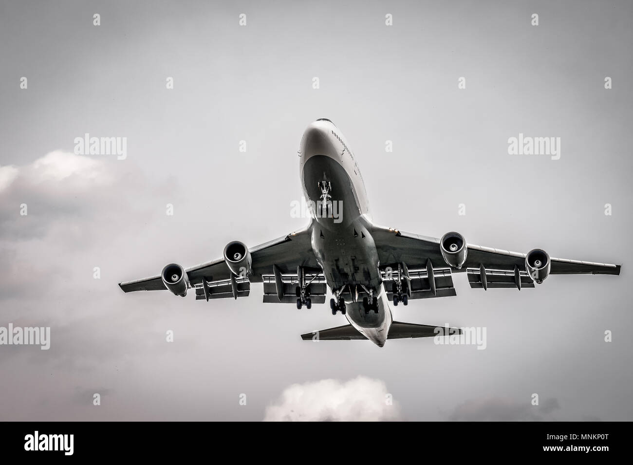 Airplane, Aircraft bottom, flying, take-off, landing Stock Photo - Alamy