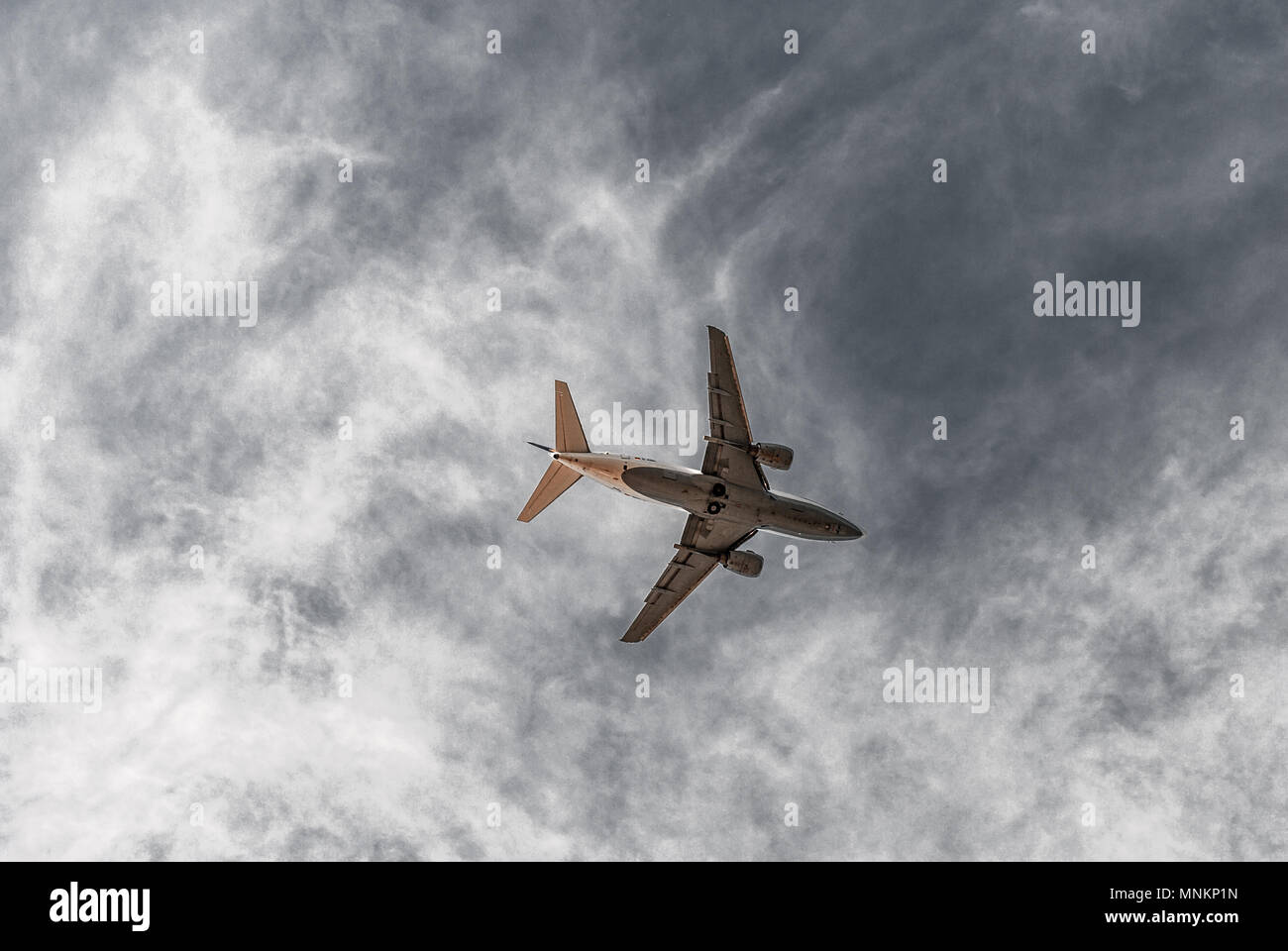 Airplane, Aircraft bottom, flying, take-off, landing Stock Photo - Alamy
