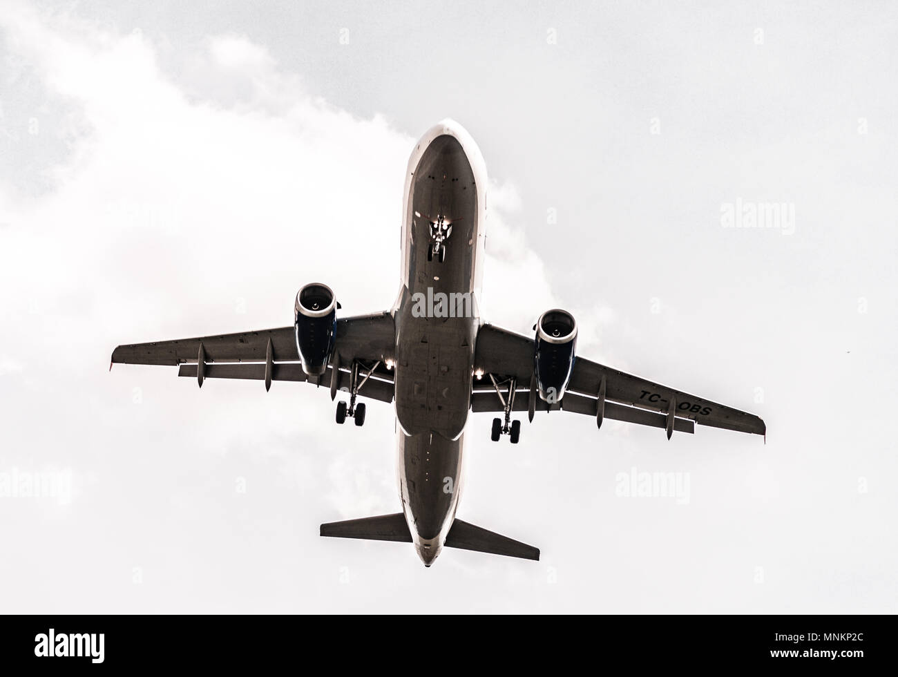 Airplane, Aircraft bottom, flying, take-off, landing Stock Photo - Alamy