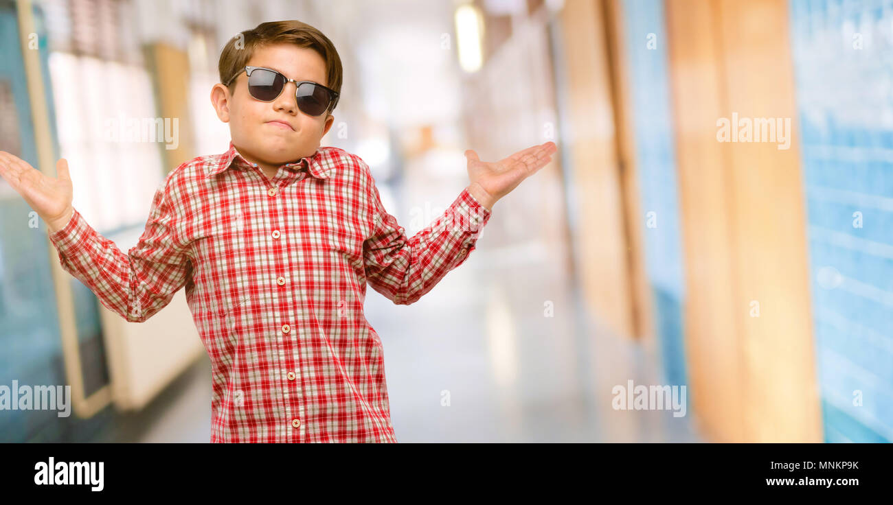 Shrug child hi-res stock photography and images - Alamy