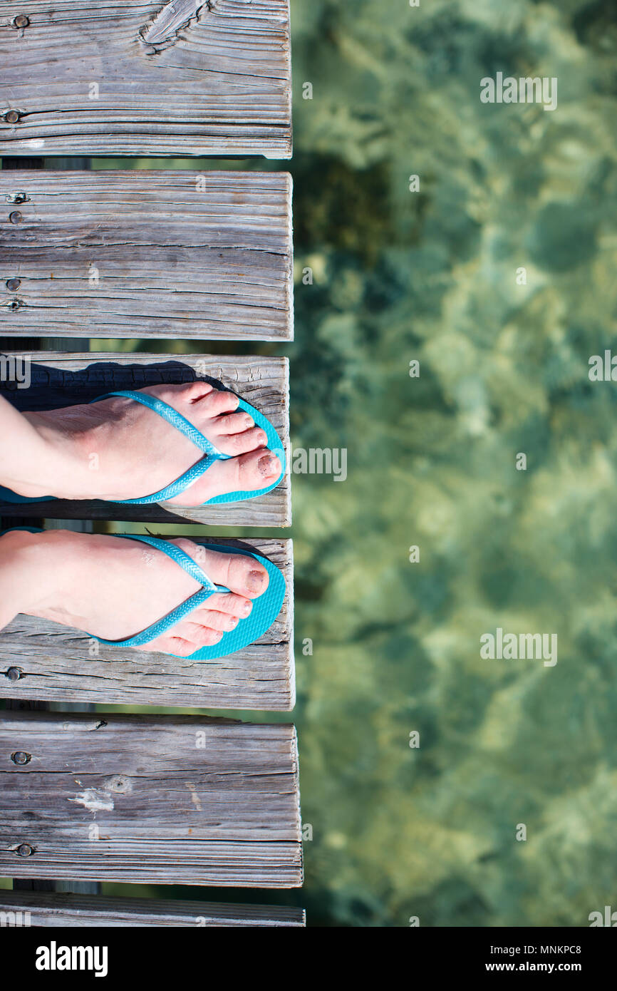 Woman wearing flip flops hi-res stock photography and images - Alamy