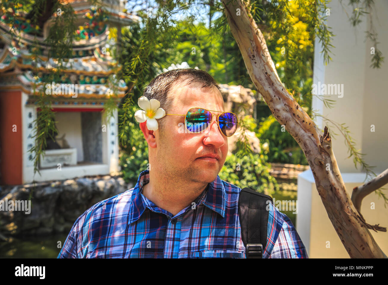 Tourist in temple Wat Prayoon (Turtle Temple) in Bangkok, Thailand ...
