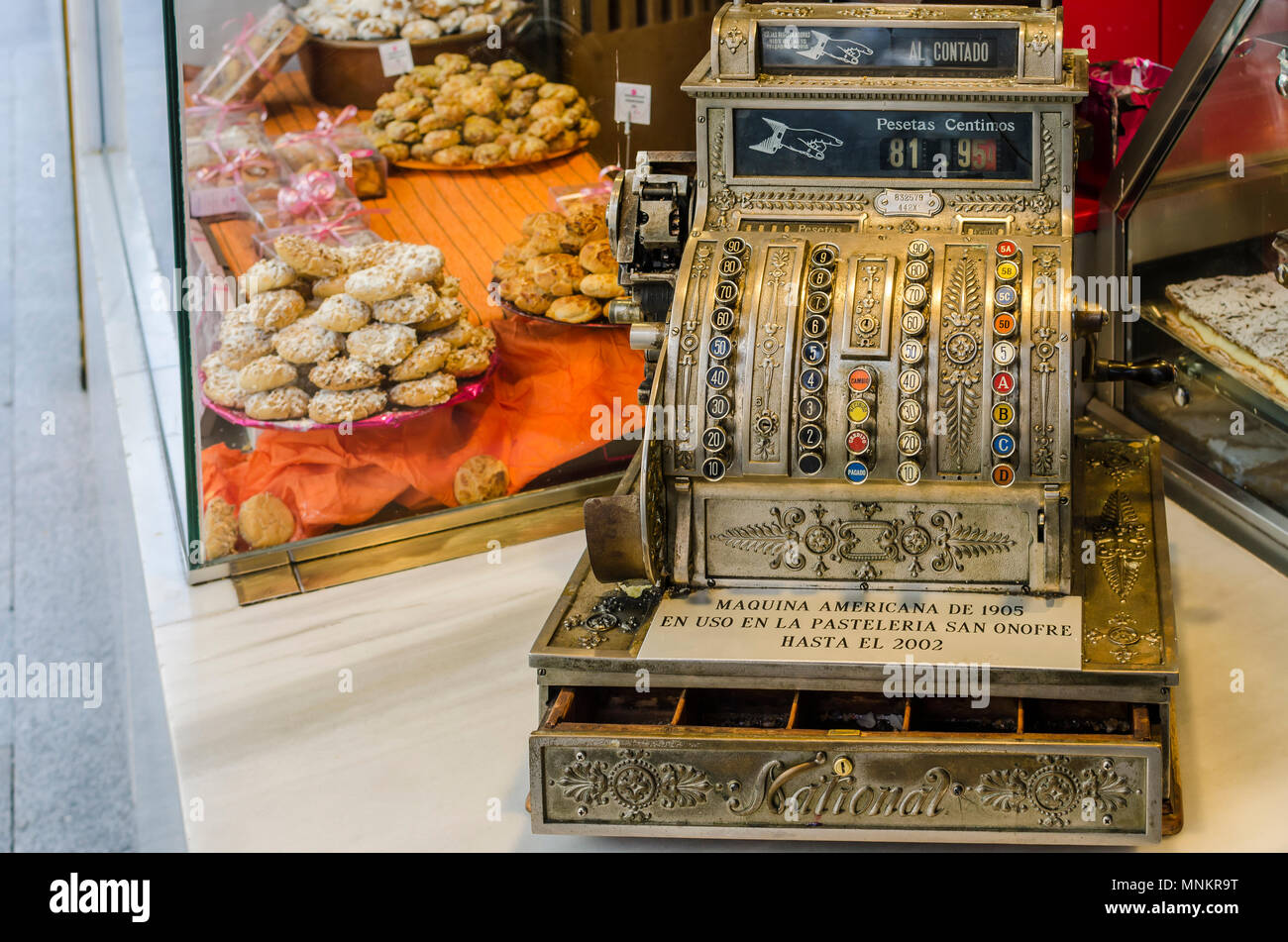 An old money box in San Miguel market, Madrid city, Spain Stock Photo ...