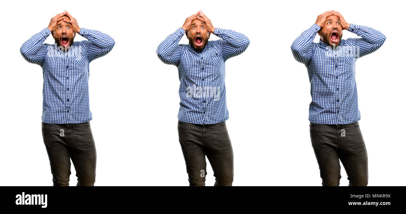 African american man with beard stressful keeping hands on head ...