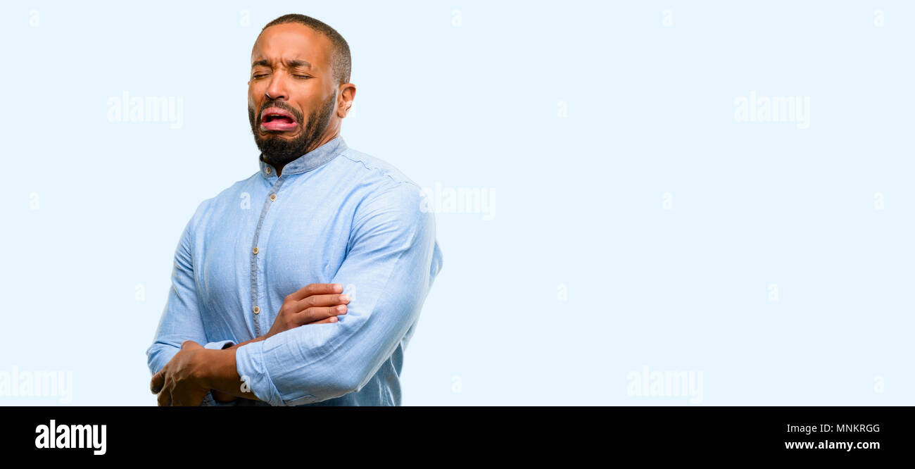 African american man with beard crying depressed full of sadness ...