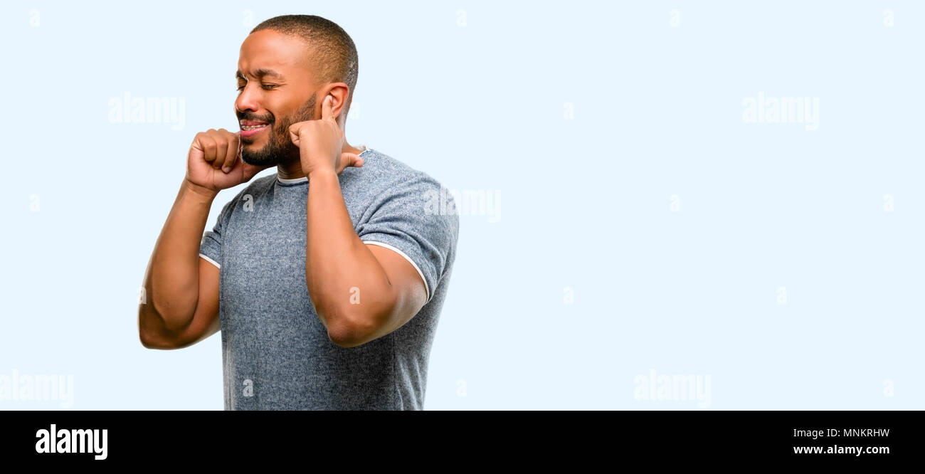 Noise and 'hands over ears' and music hi-res stock photography and ...
