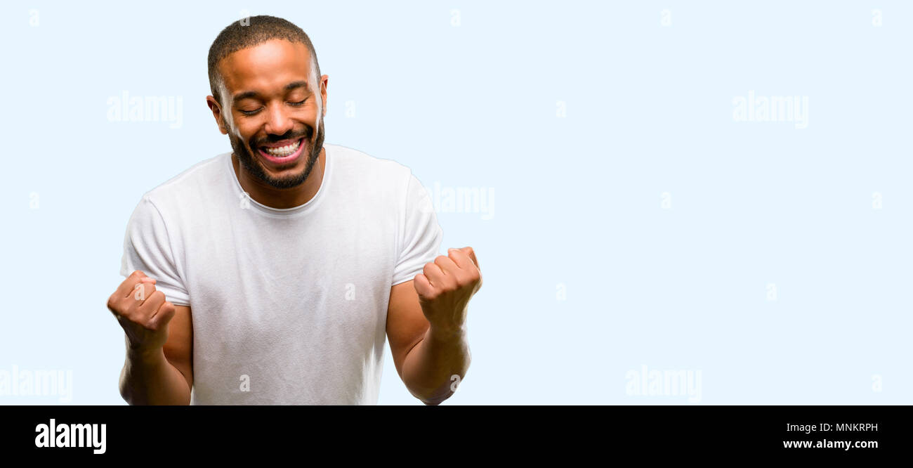 Male african triumphant fist hi-res stock photography and images - Alamy