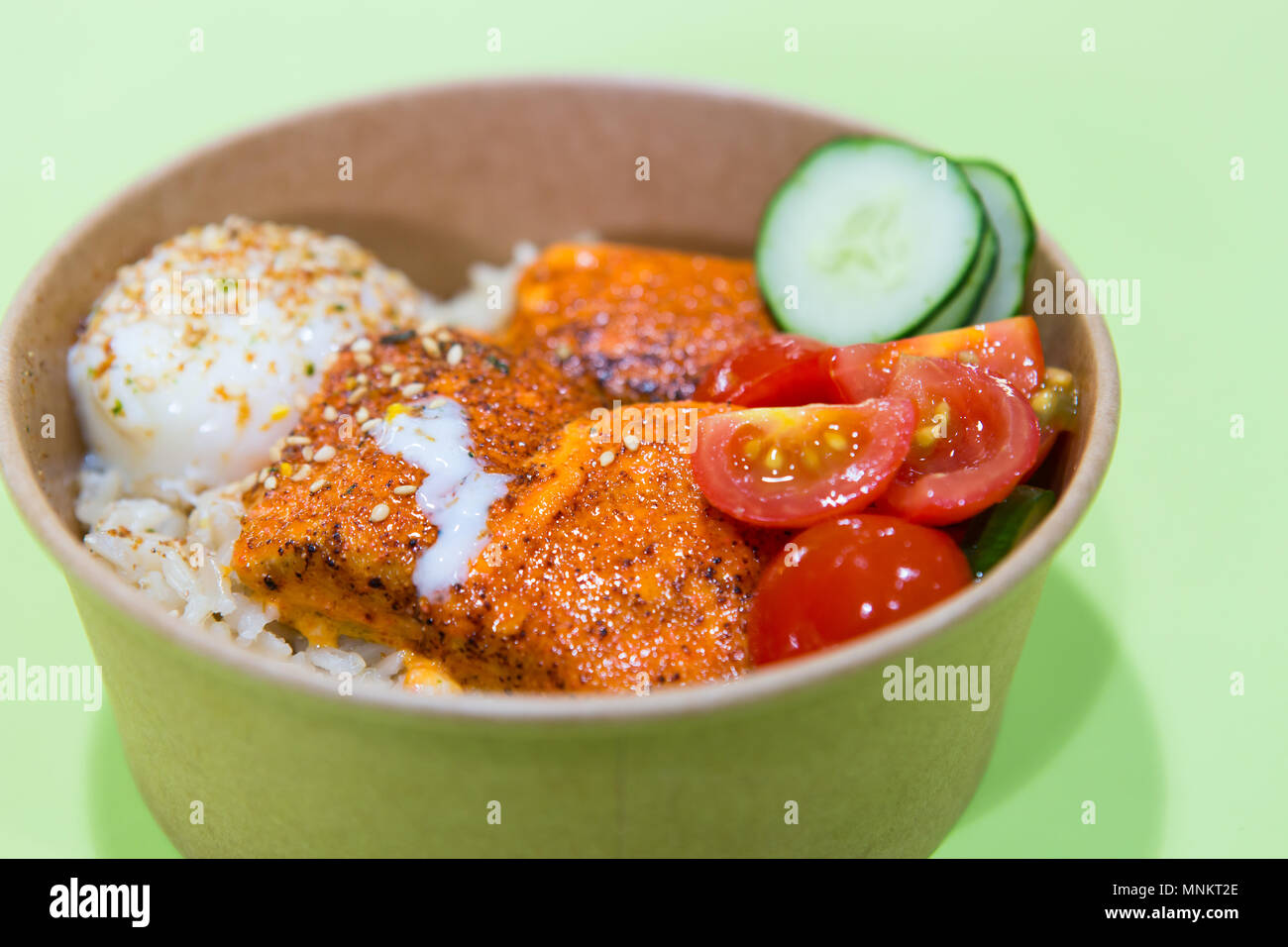 Delicious Japanese food in paper bowl put on a green table surface, at ...