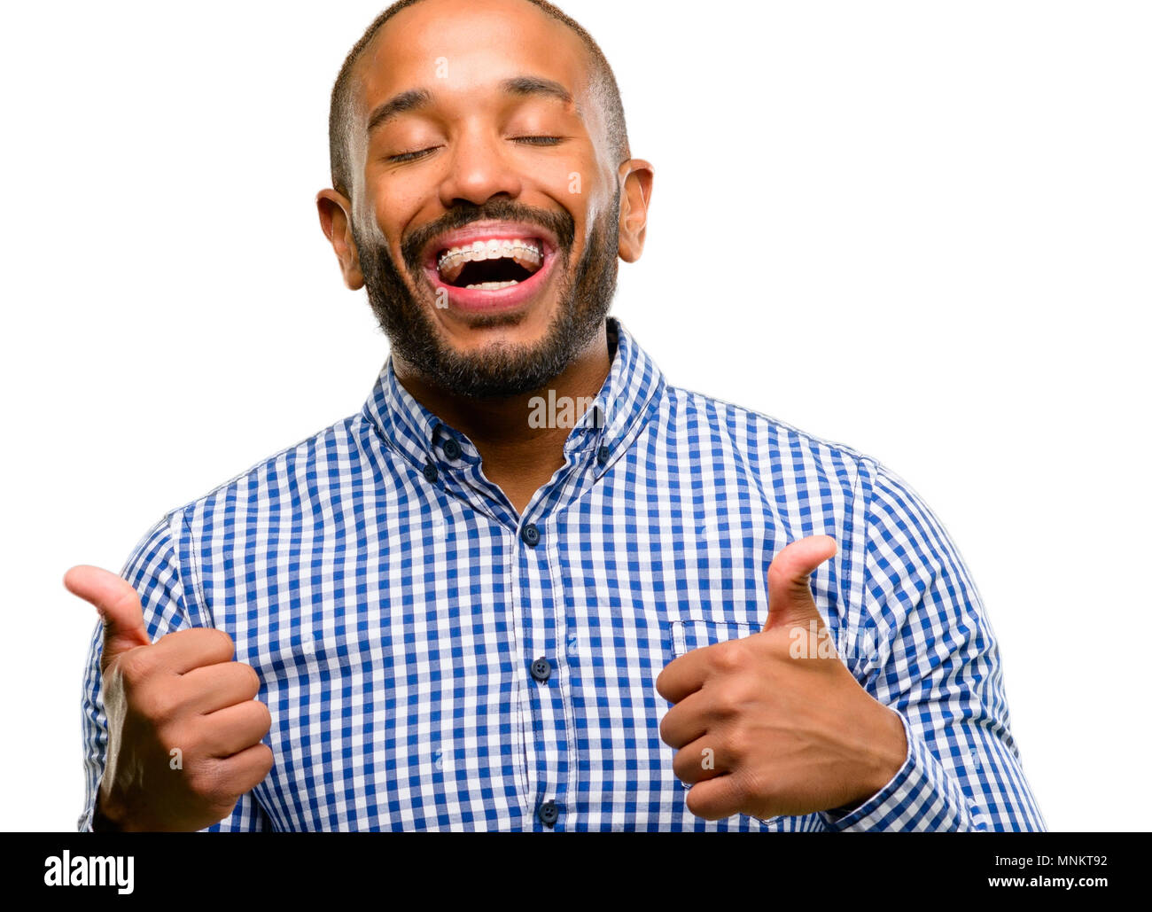 African american man with beard smiling broadly showing thumbs up ...