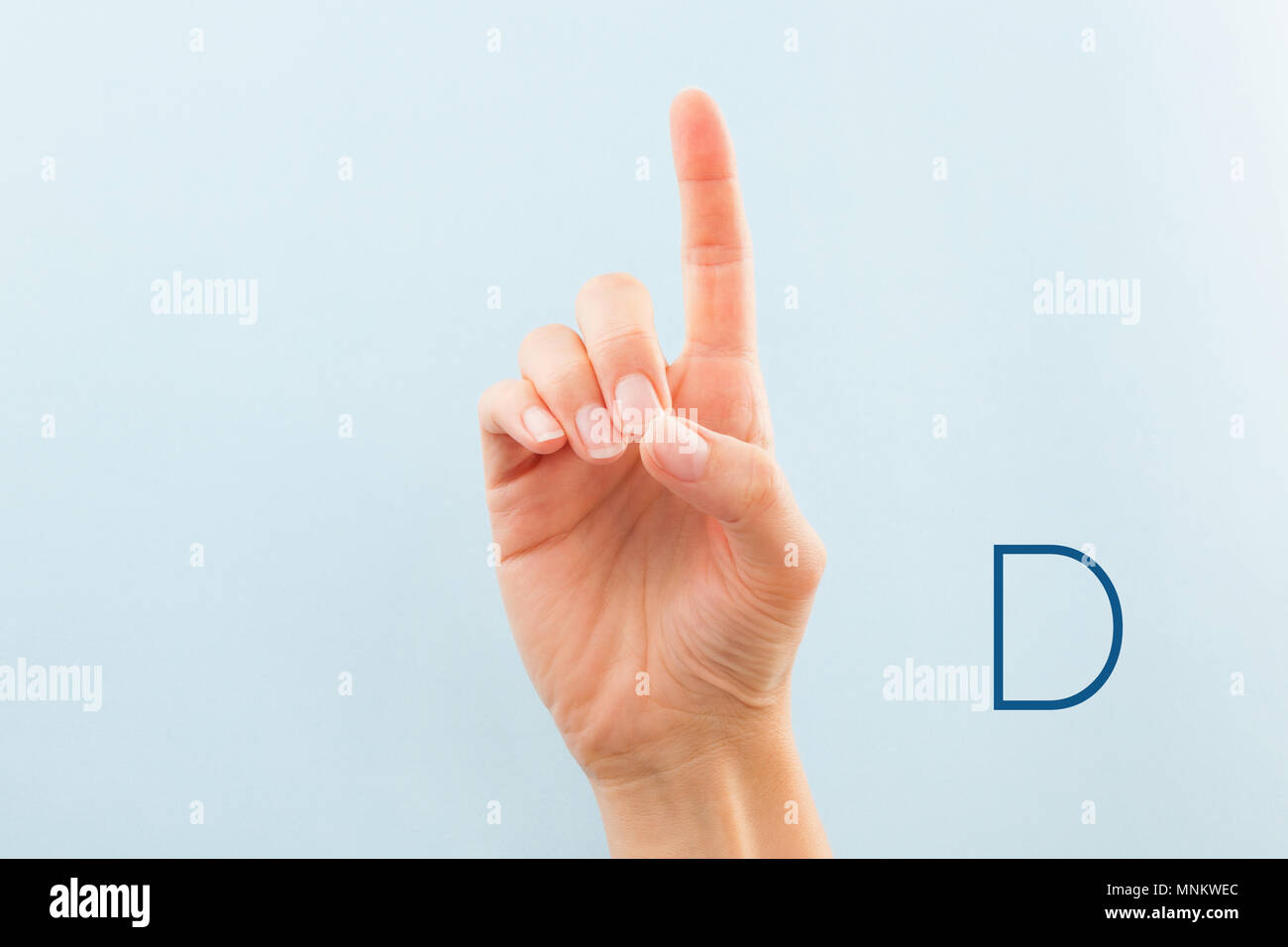 American sign language. Female hand showing letter D isolated on blue ...