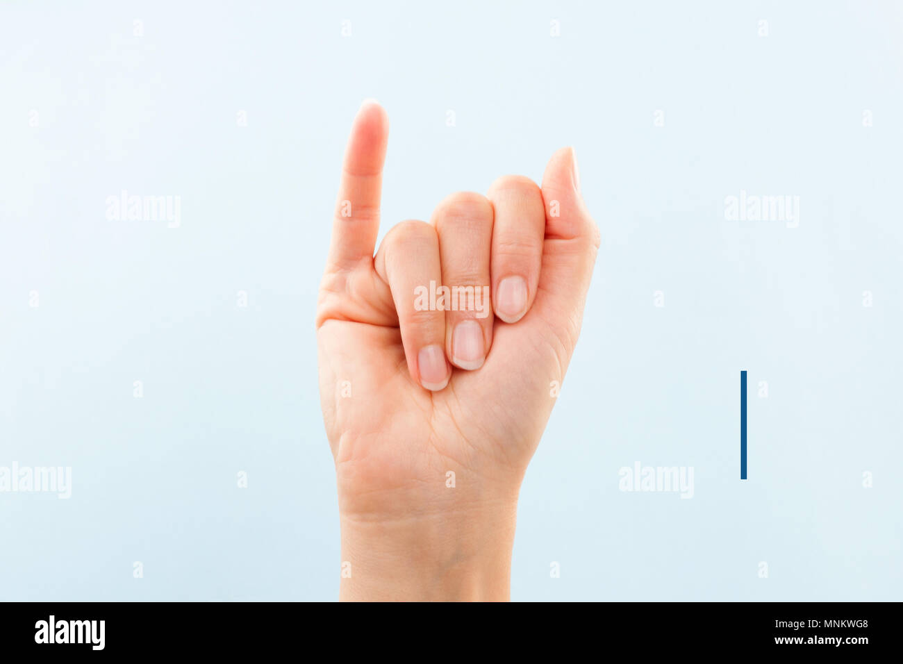 American sign language. Female hand showing letter I isolated on blue ...