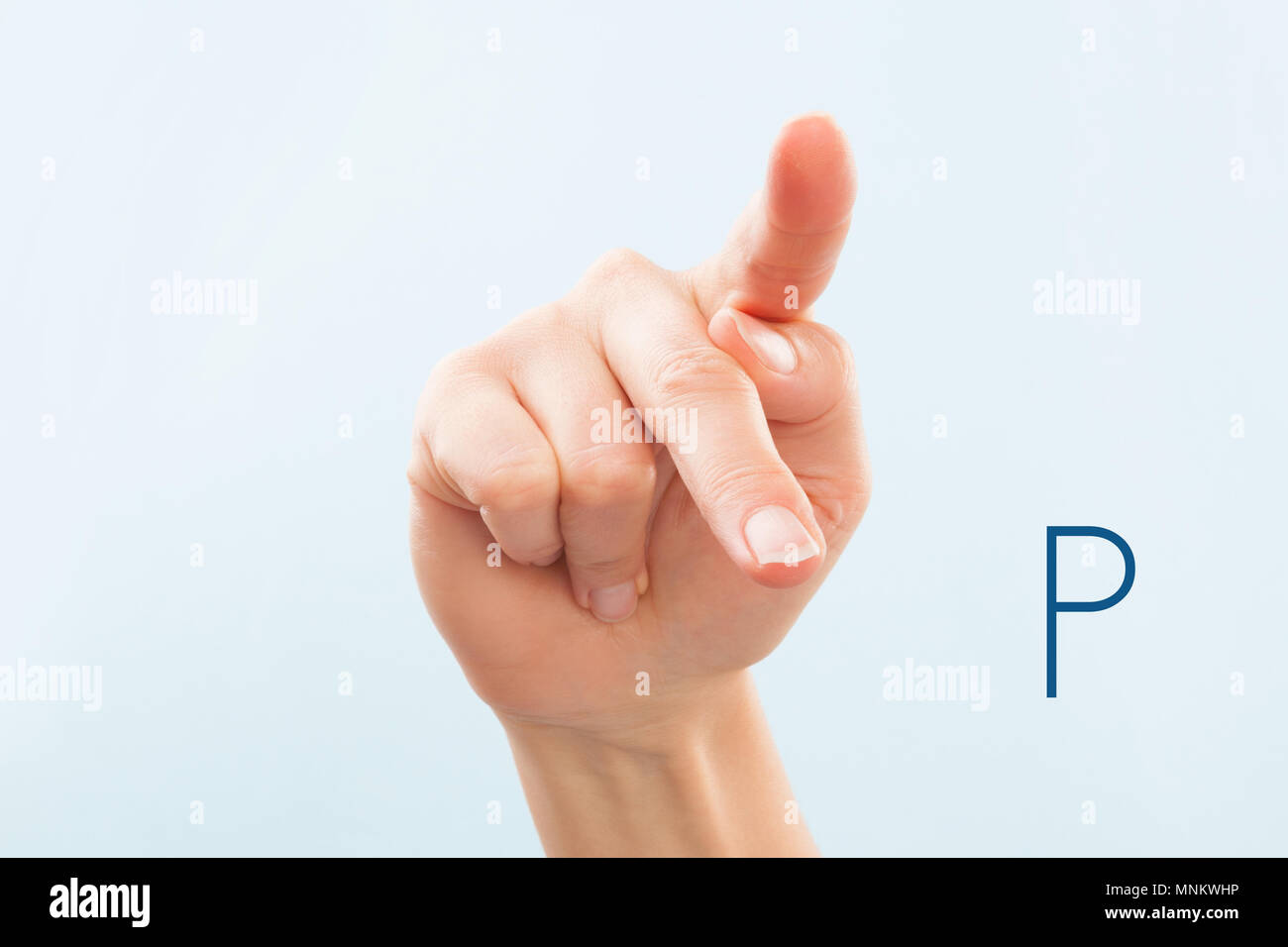 American sign language. Female hand showing letter P isolated on blue ...
