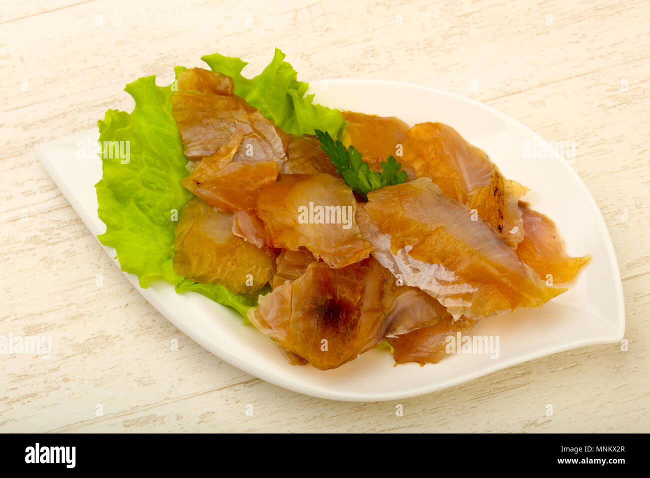 Smoked catfish fillet carpaccio Stock Photo - Alamy