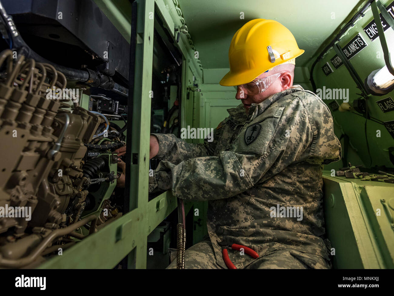 Sgt. Thomas Green, a U.S. Army Reserve mechanic with the 447th Military ...