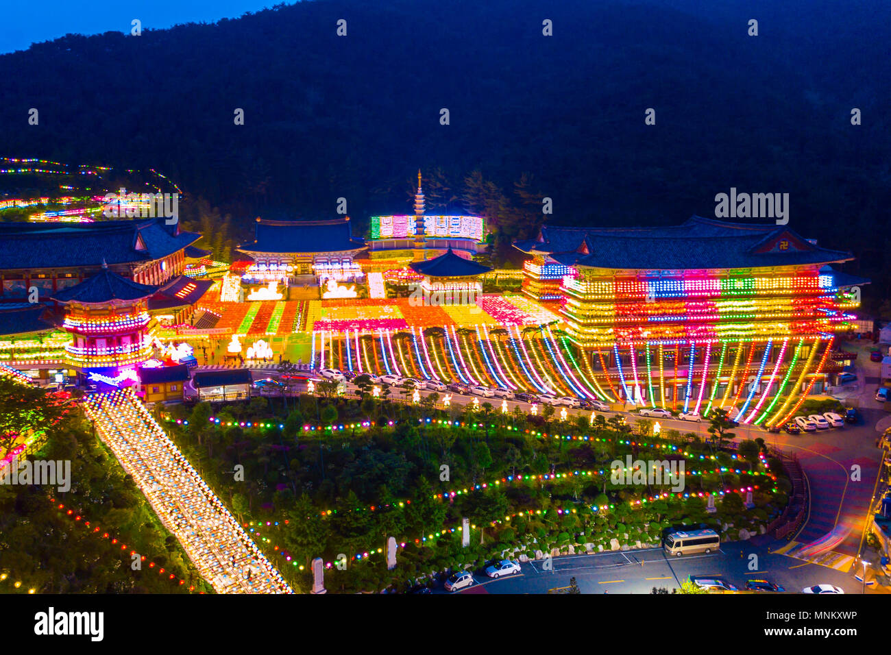 Aerial view of Samgwangsa temple at nighttime in Busan city, South Korea.Thousands of paper ...