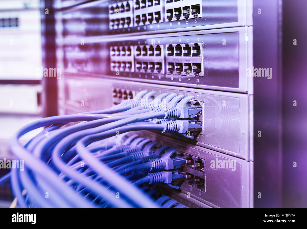 network cables and hub closeup with fiber optical background Stock ...