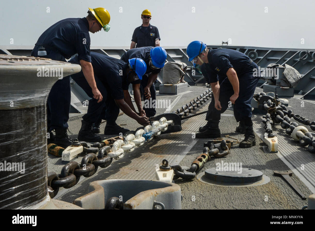 ARABIAN GULF (March 16, 2018) Sailors attach a pelican hook to the ...